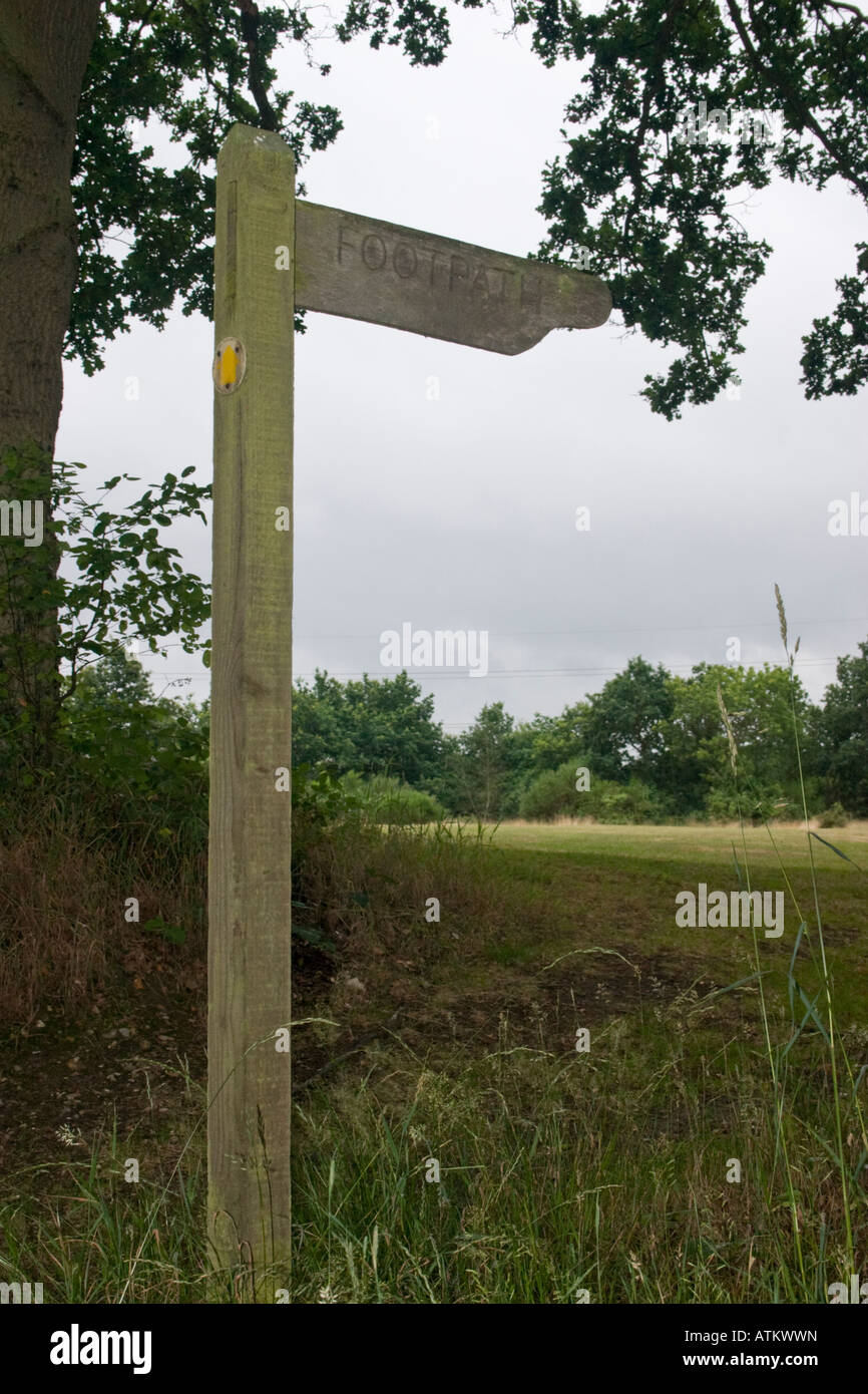Wooden footpath signpost on country path Stock Photo - Alamy
