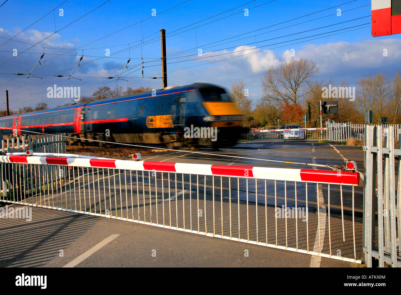 GNER 82 class DVT Electric HST train ECML Lolham crossing Peterborough ...