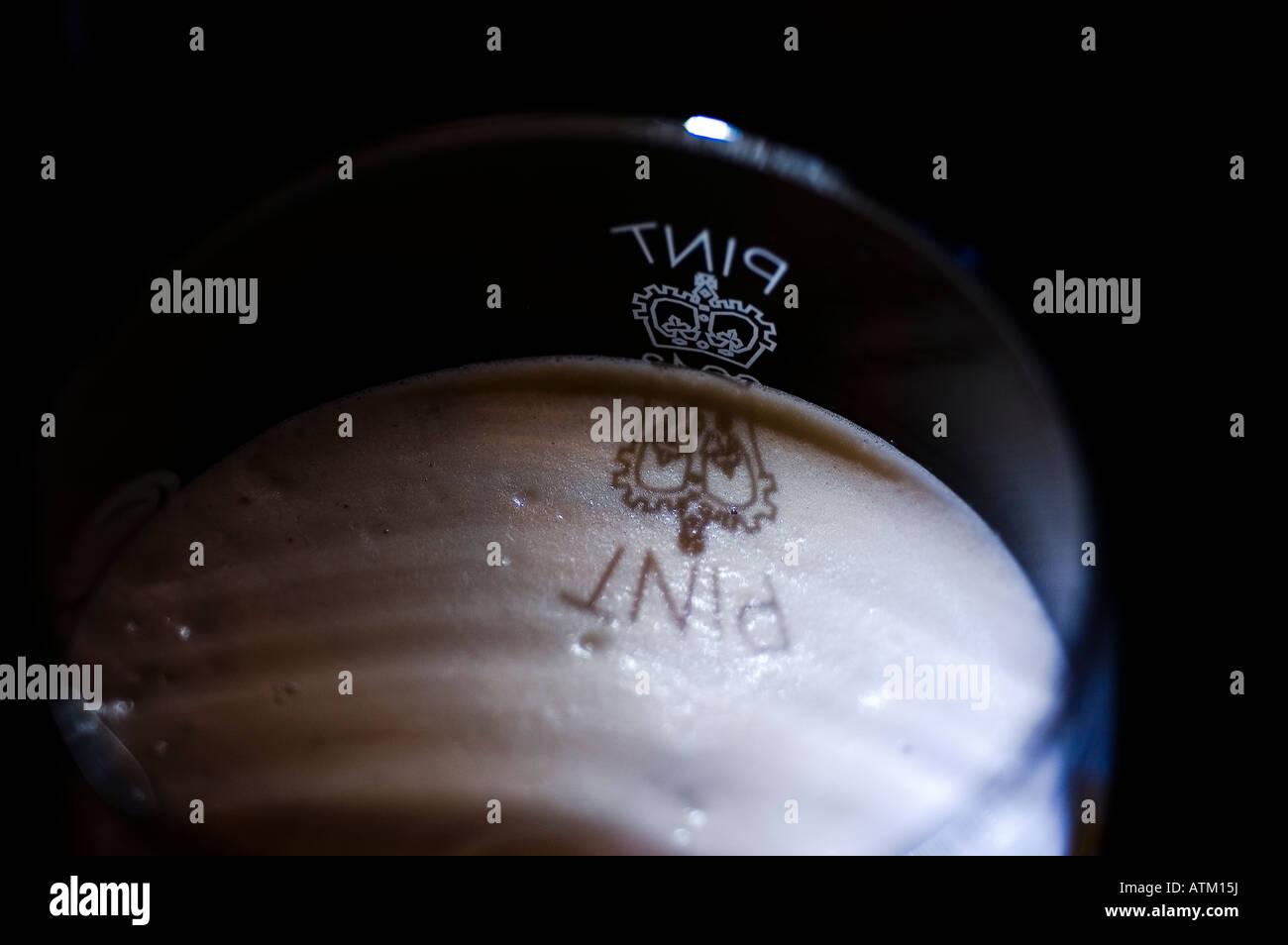 The pint symbol casts a shadow across the beers foam Stock Photo - Alamy