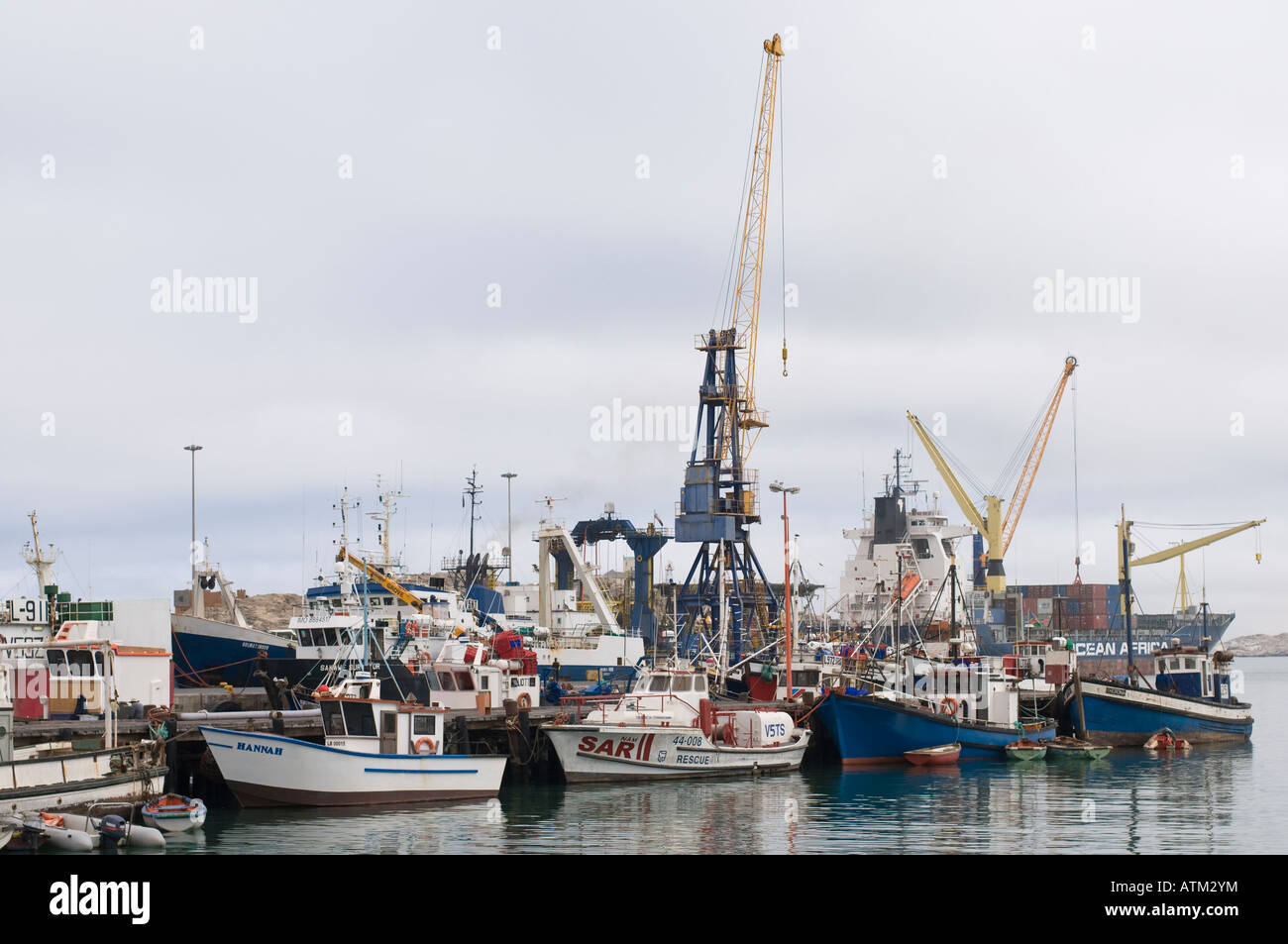 Fishing boats in the Luderitz harbour in Namibia Stock Photo - Alamy