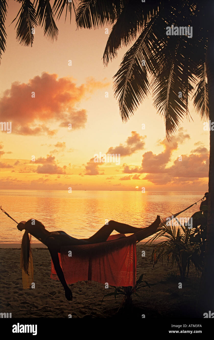 Women in hammocks hi-res stock photography and images - Alamy