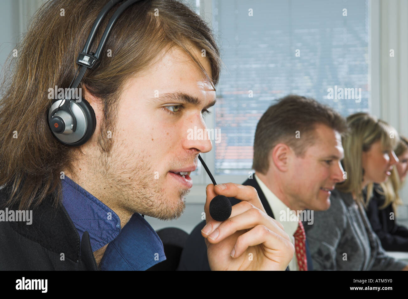 people working in a call center Stock Photo - Alamy