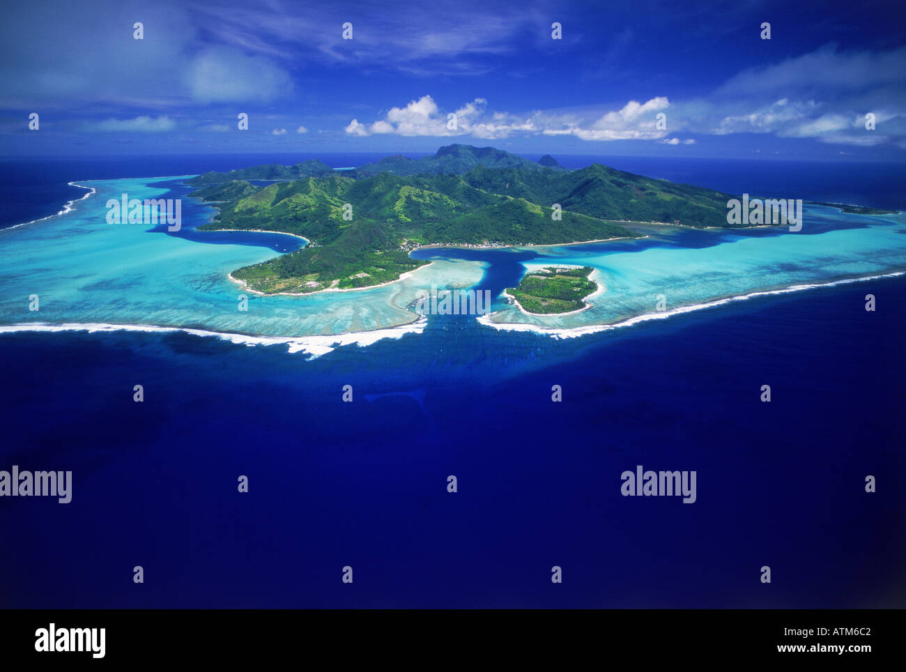 Aerial view of Huahine Island anchored in the blue South Pacific in the ...