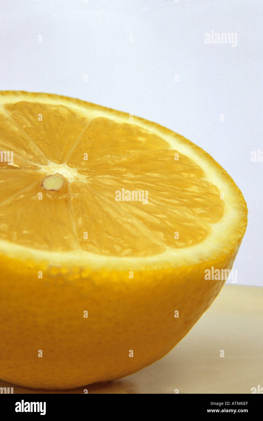 A lemon sliced in half Stock Photo - Alamy