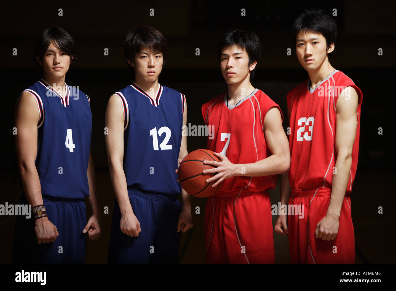 Four young Asian basketball players Stock Photo - Alamy