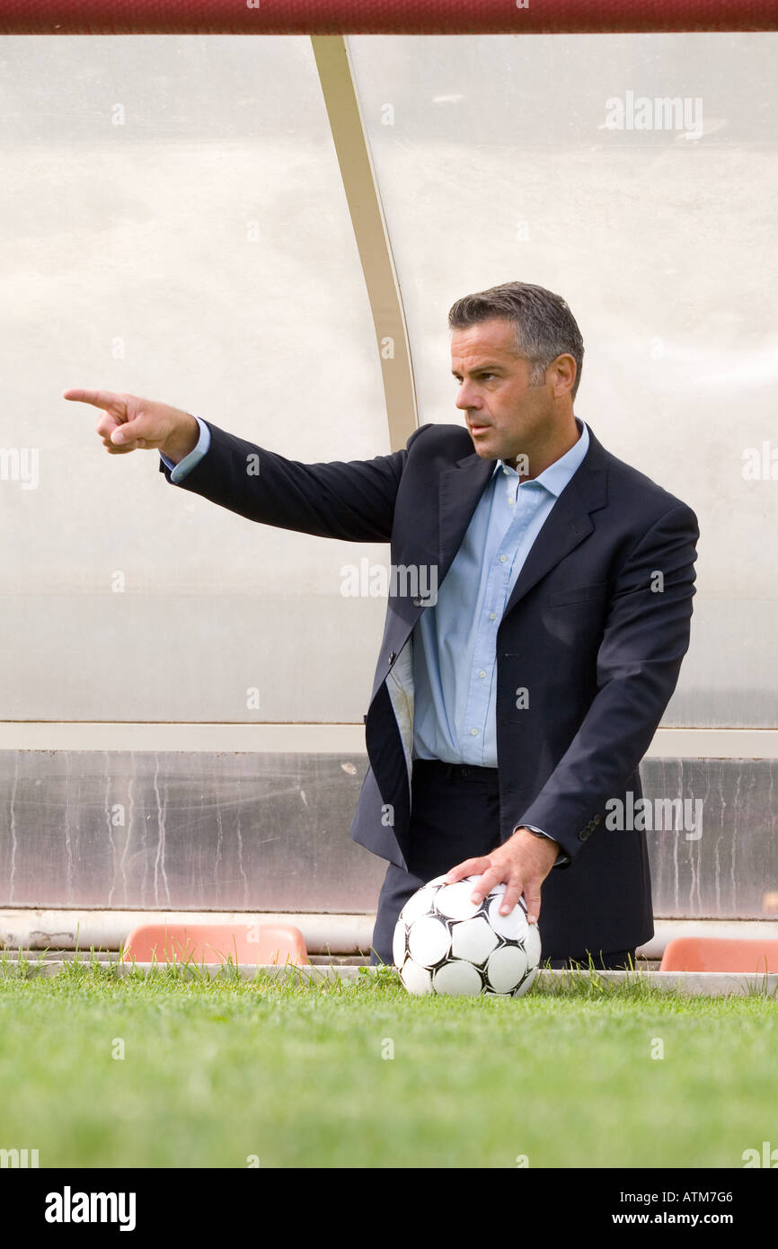 Direction pointing sports coach hi-res stock photography and images - Alamy