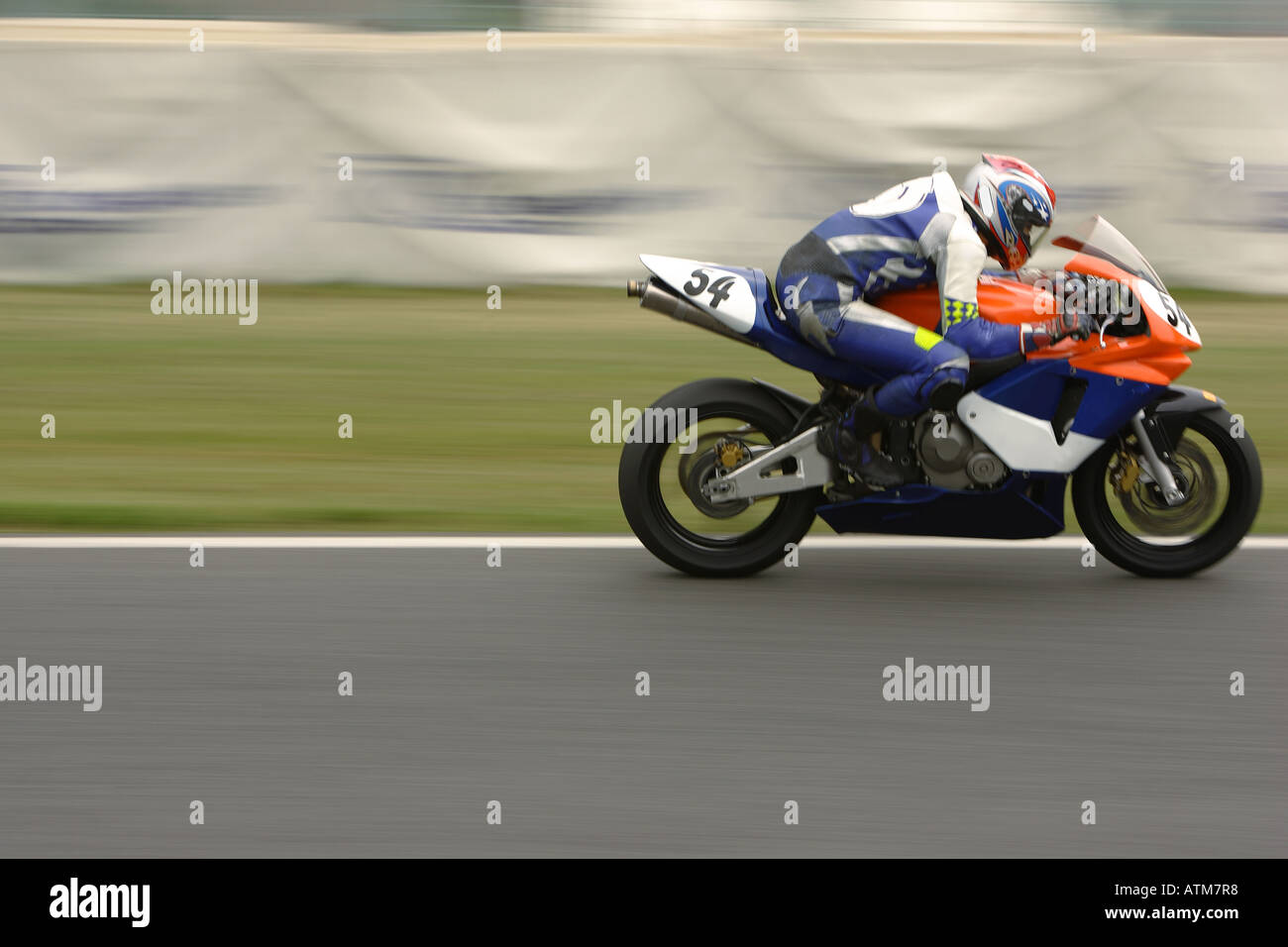 Racing motor bike on track Stock Photo - Alamy