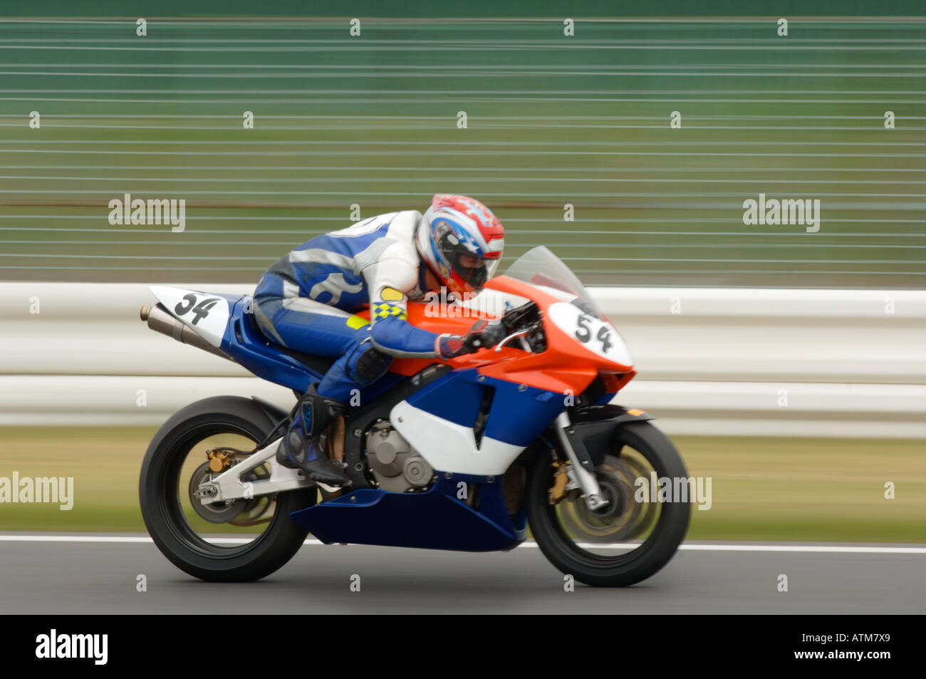 Racing motor bike on the straight Stock Photo - Alamy