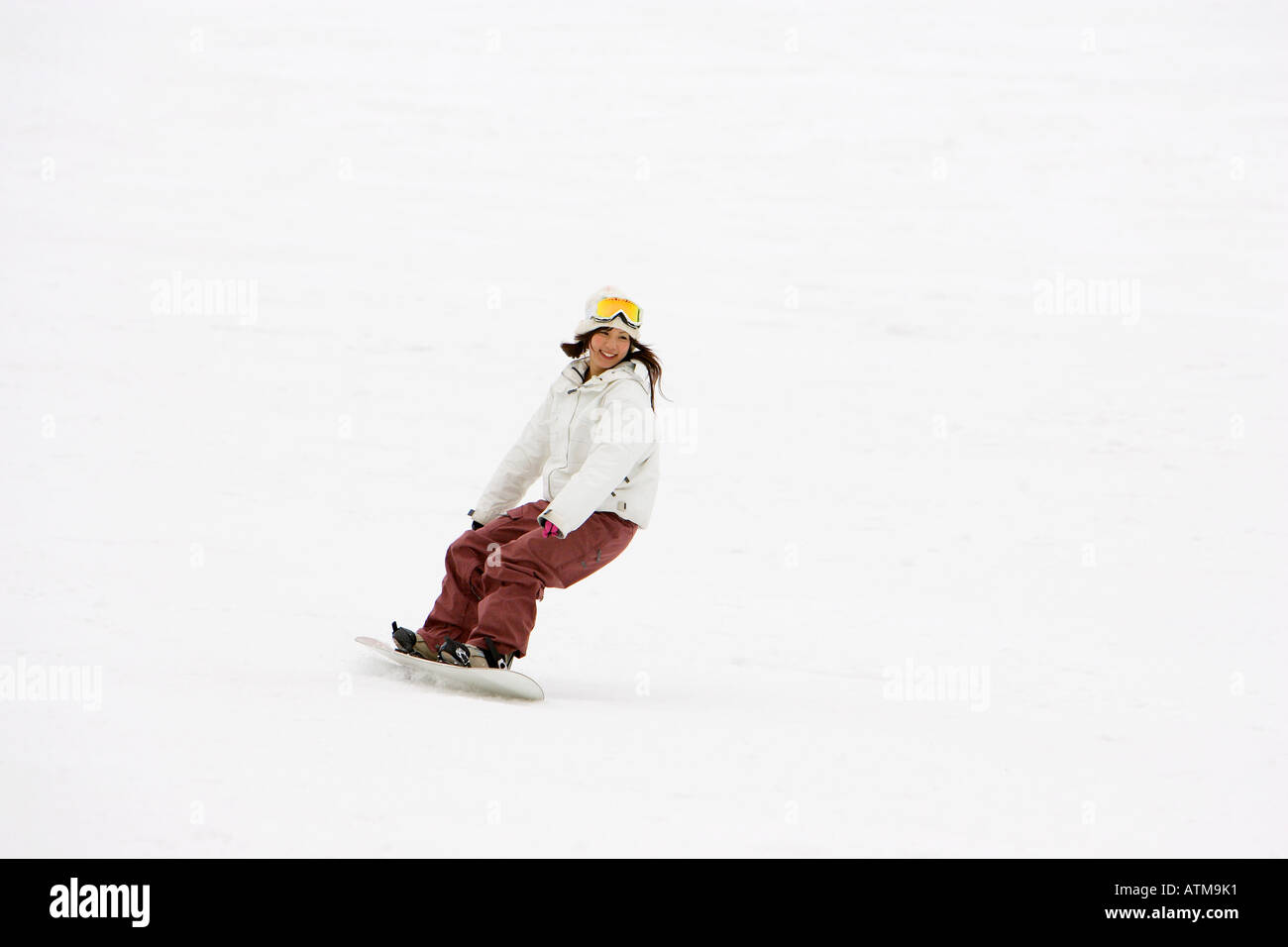 Cute young asian snowboarder hi-res stock photography and images - Alamy