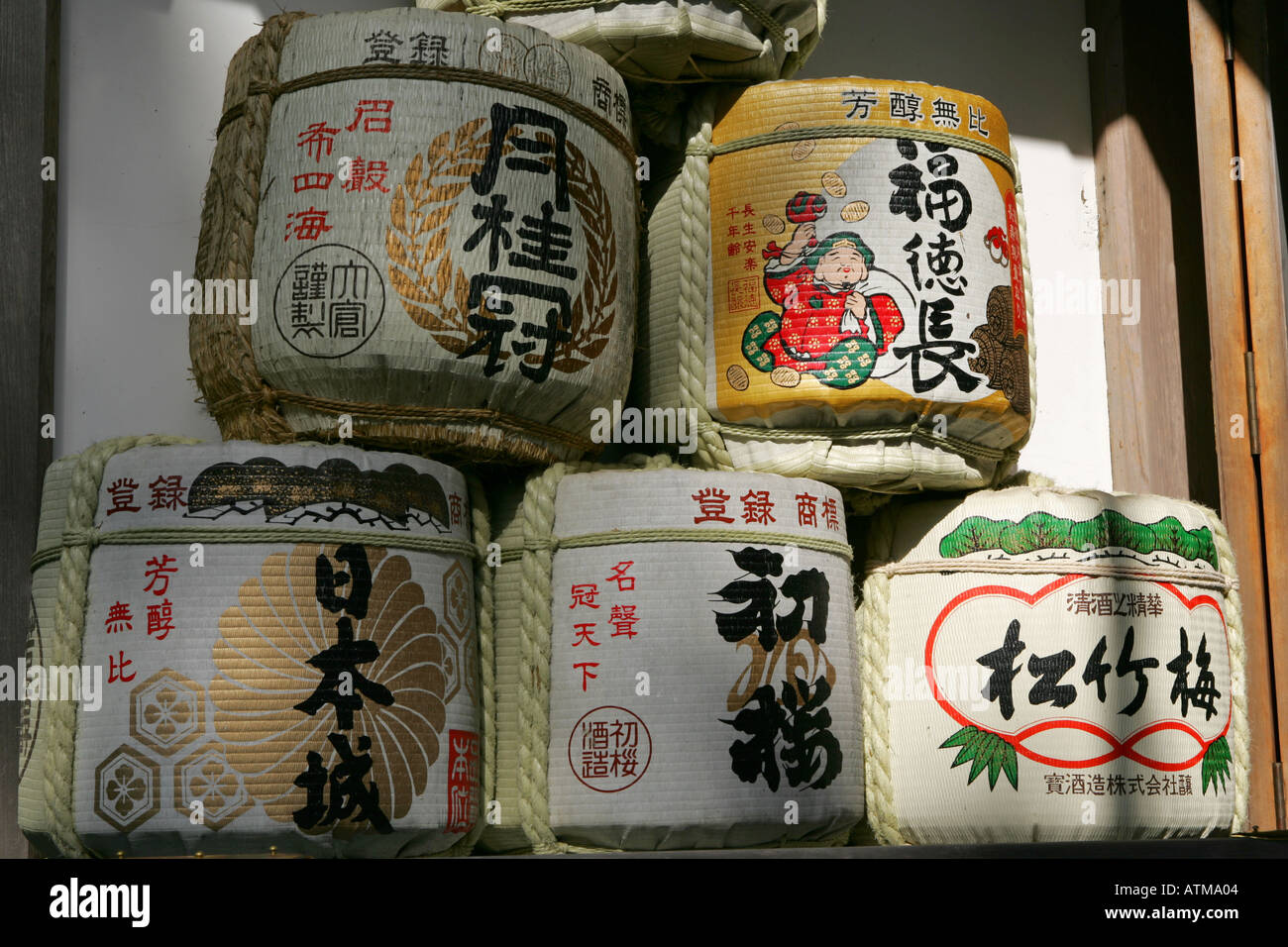 Iconic typical large colourful sake barrels stacked outside Kumano ...