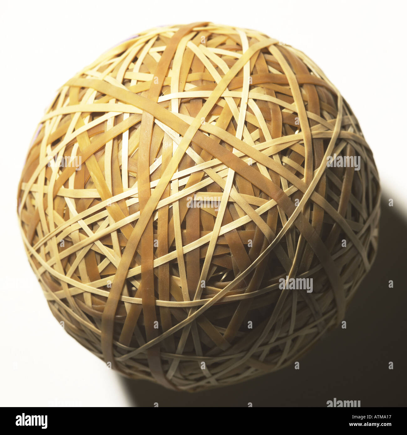 Rubber band ball on a white background Stock Photo - Alamy
