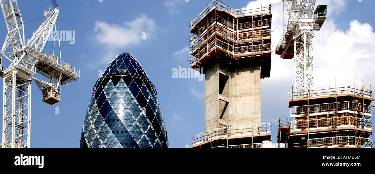 The Gherkin along side a building under construction Stock Photo - Alamy