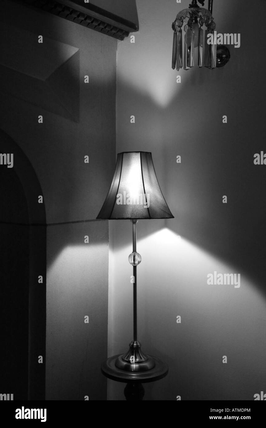 An unusual lamp lighting up a corner giving unusual shapes Stock Photo ...