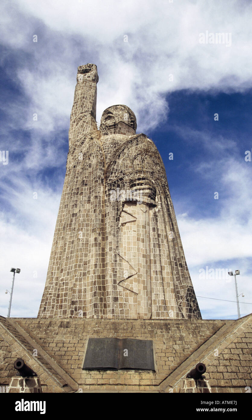 Isla Janitzio island Large stone statue on hilltop Arm raised Jose ...