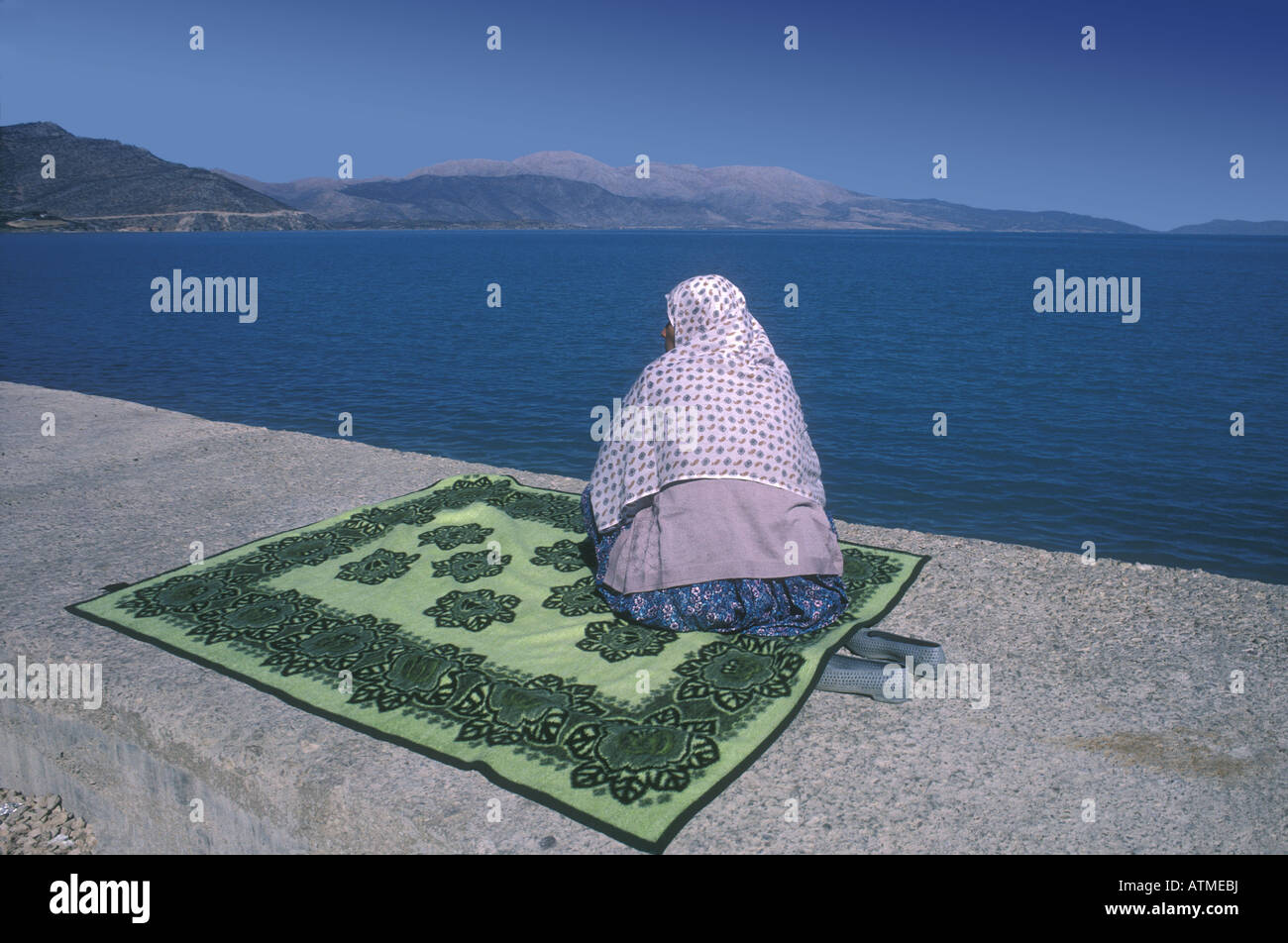 Woman wearing hijab sits in hi-res stock photography and images - Alamy