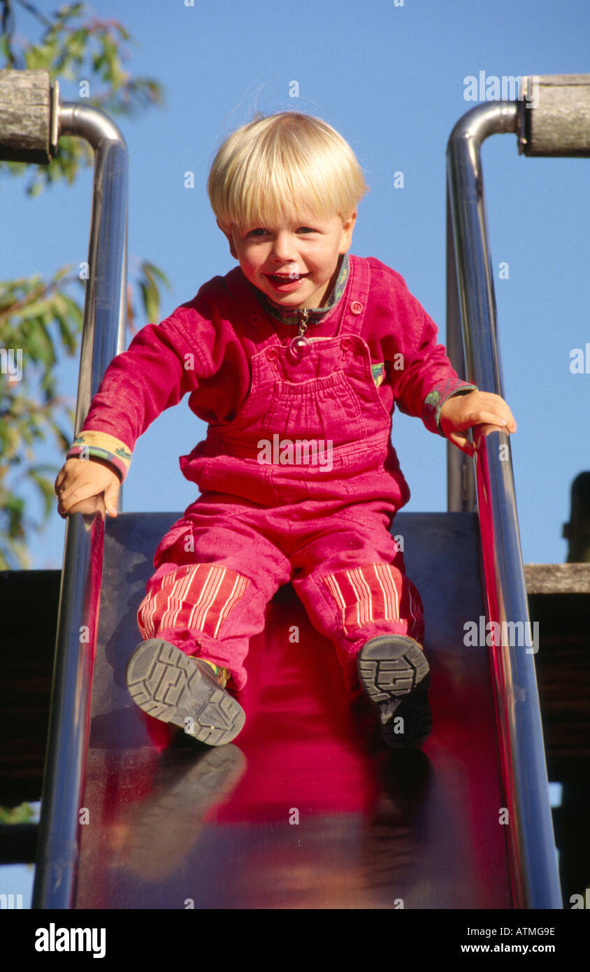 Child on slide Stock Photo - Alamy