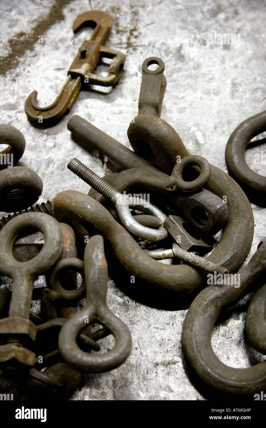 Rusty iron pieces on a workbench Stock Photo - Alamy