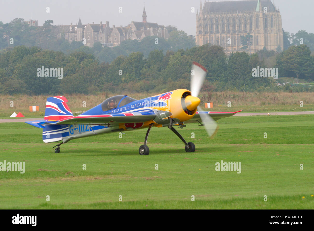 Red Bull Matador taxiing across grass at Shoreham Airshow with Lancing ...