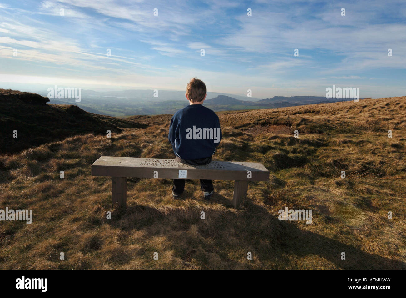 Boy sitting alone hi-res stock photography and images - Alamy