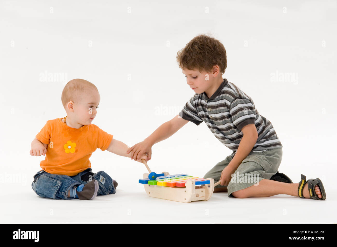 two brothers playing Stock Photo - Alamy