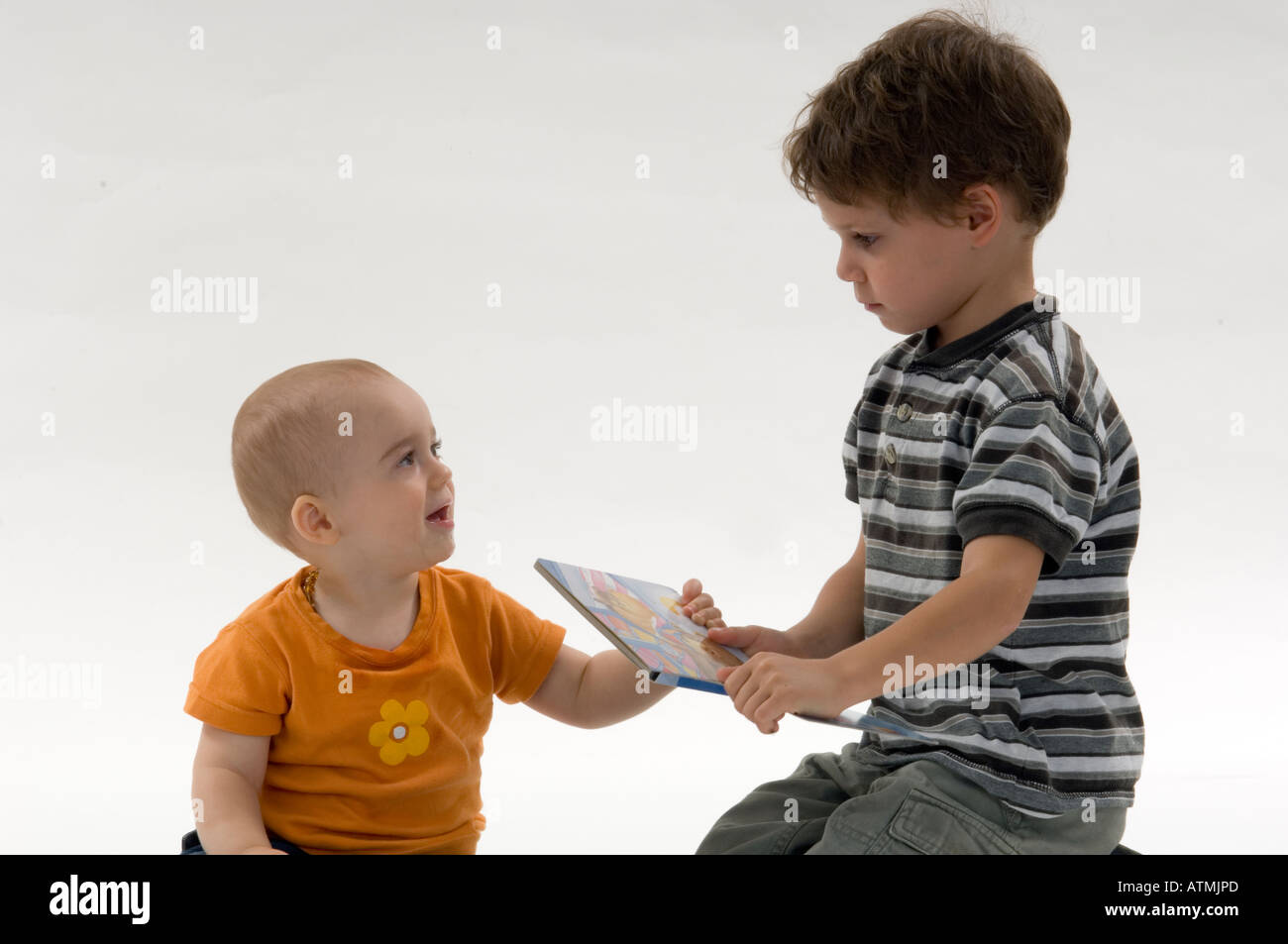 two brothers playing Stock Photo - Alamy