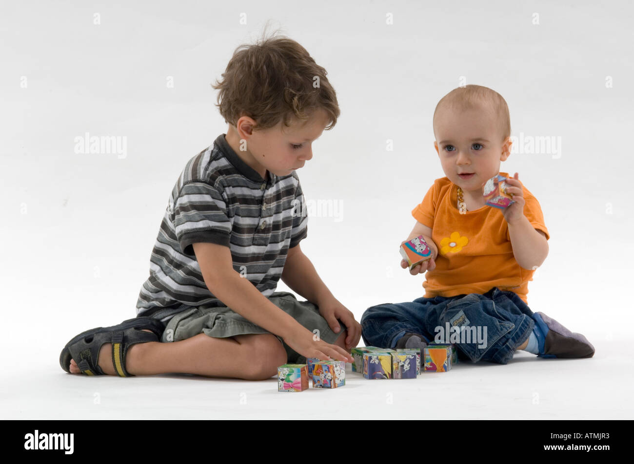 two brothers playing Stock Photo - Alamy
