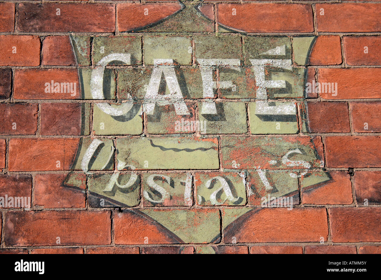 cafe sign painted on brick wall Stock Photo - Alamy
