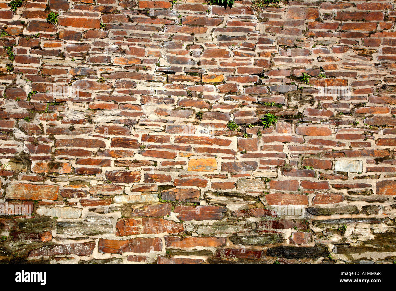 Close up of an old stone blocks wall Stock Photo - Alamy
