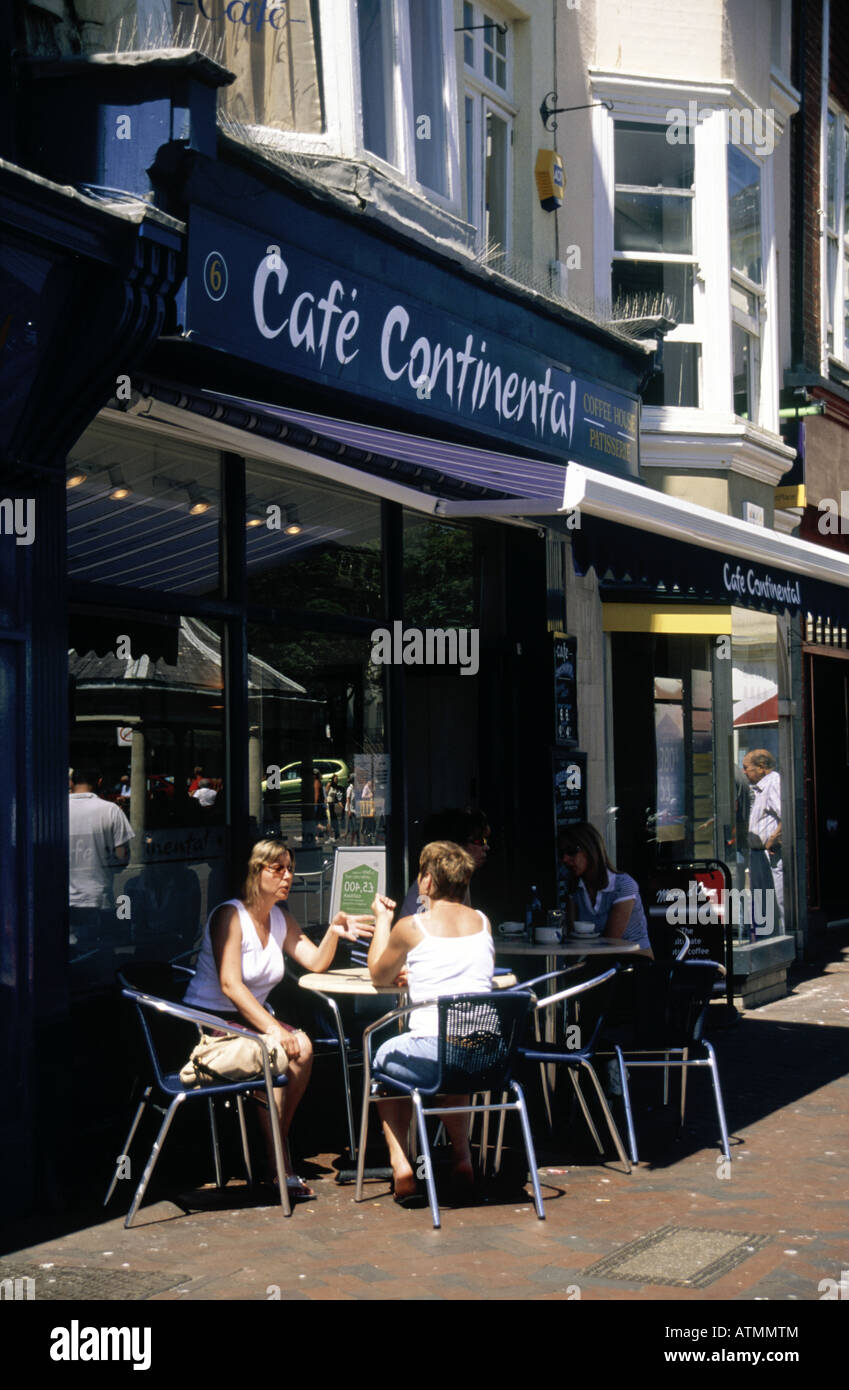 Montague Place Cafe Continental Two young women seated at table Stock ...
