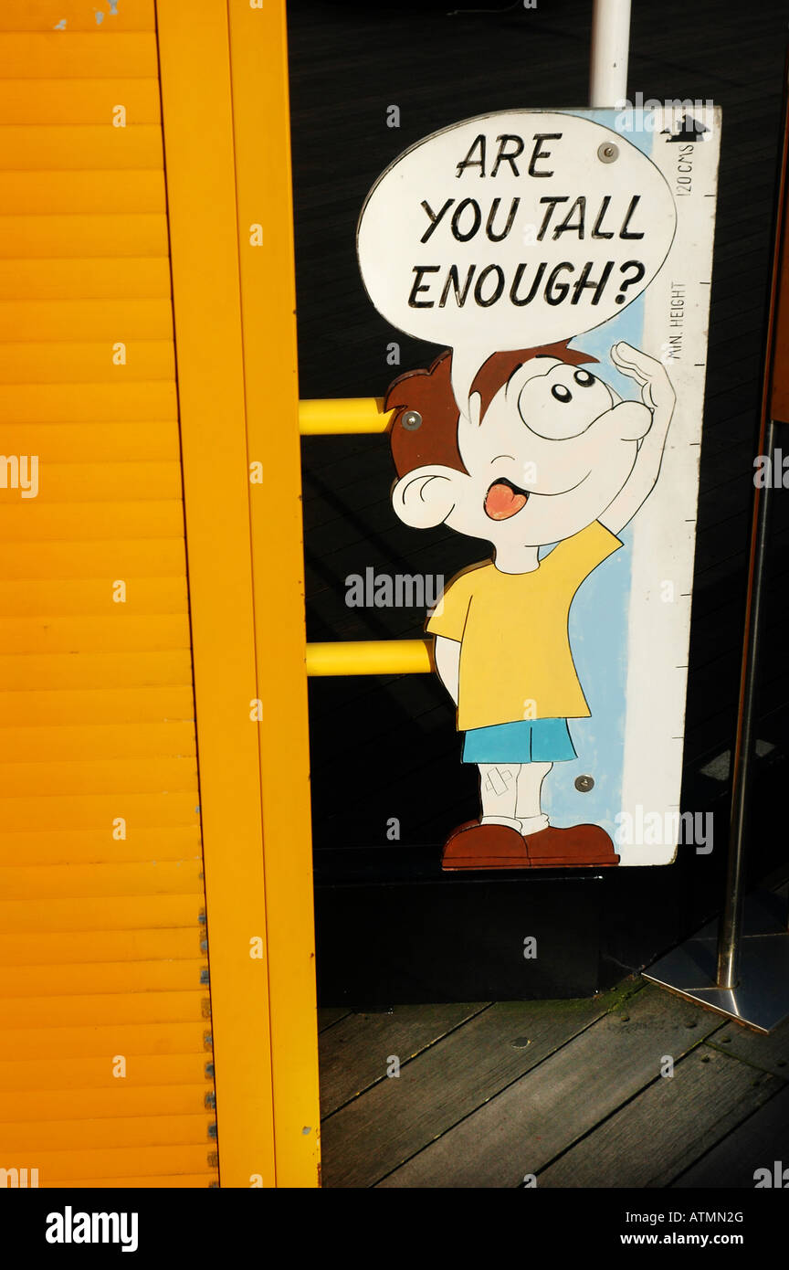 Must be this tall to ride sign hi-res stock photography and images - Alamy