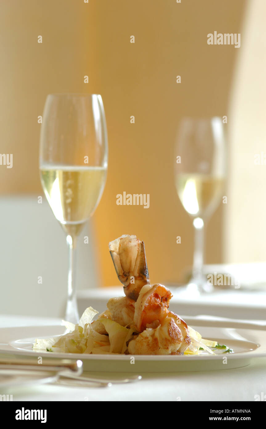 food and champagne on a nicely set table Stock Photo - Alamy