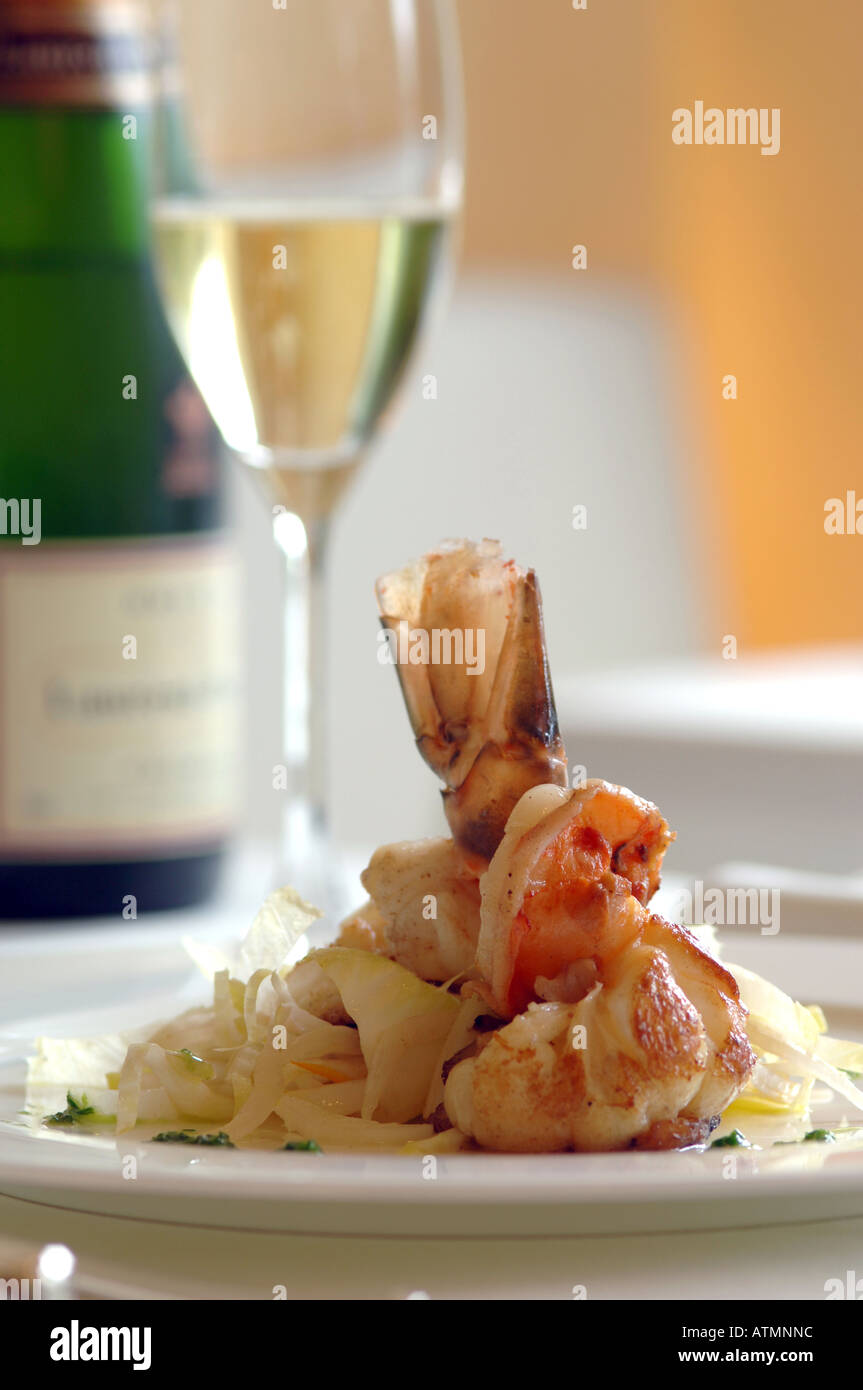 food and champagne on a nicely set table Stock Photo - Alamy
