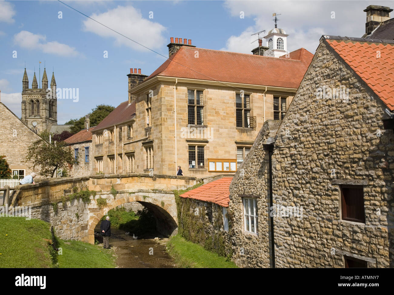 Town Hall and stone bridge over River Rye in picturesque Helmsley North ...