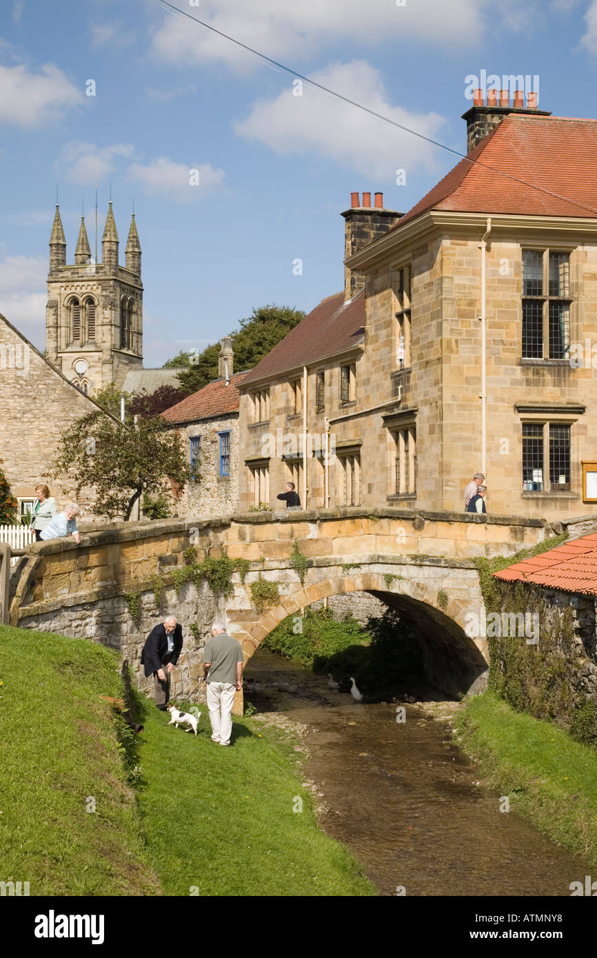 Town Hall and stone bridge over River Rye in picturesque Helmsley North ...