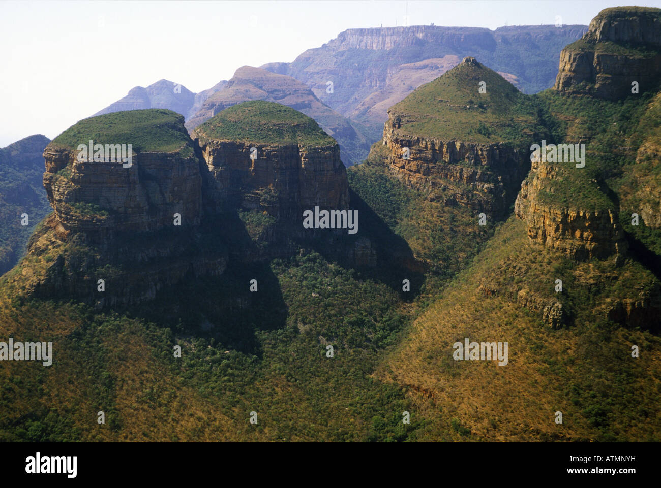 Rock formations Rounded mountain pillars topped with vegetation Canyons ...