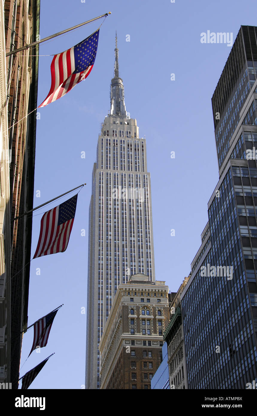 Empire State Building as viewed past stars and stripes United States ...