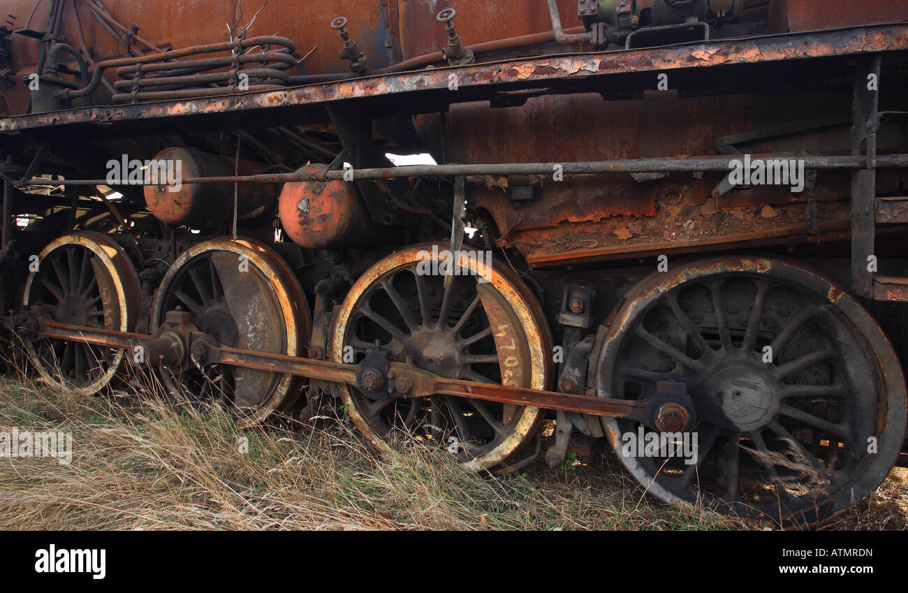 Abandoned old steam engine wheels Stock Photo - Alamy
