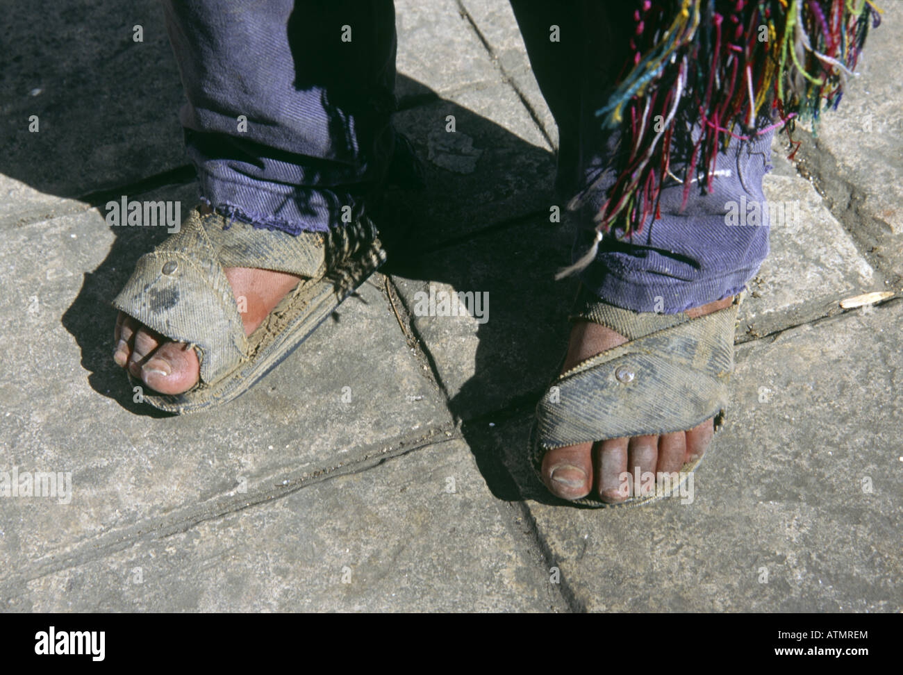Close up Person Feet Shod in leather crossed sandals Dusty feet Stock ...