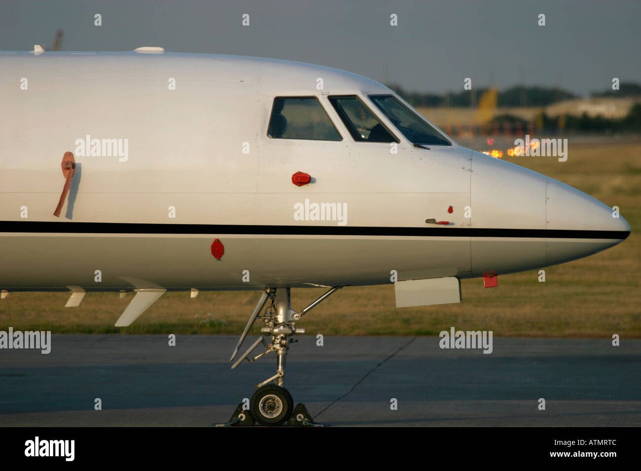 Front part of corporate jet Stock Photo - Alamy