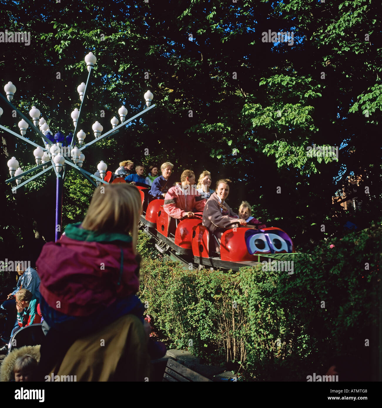 Roller coaster ride, Tivoli gardens amusement park, Copenhagen, Denmark ...