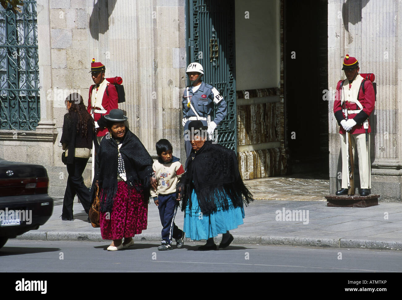 Presidential Palace Guards military policeman Two women in Aymara dress ...
