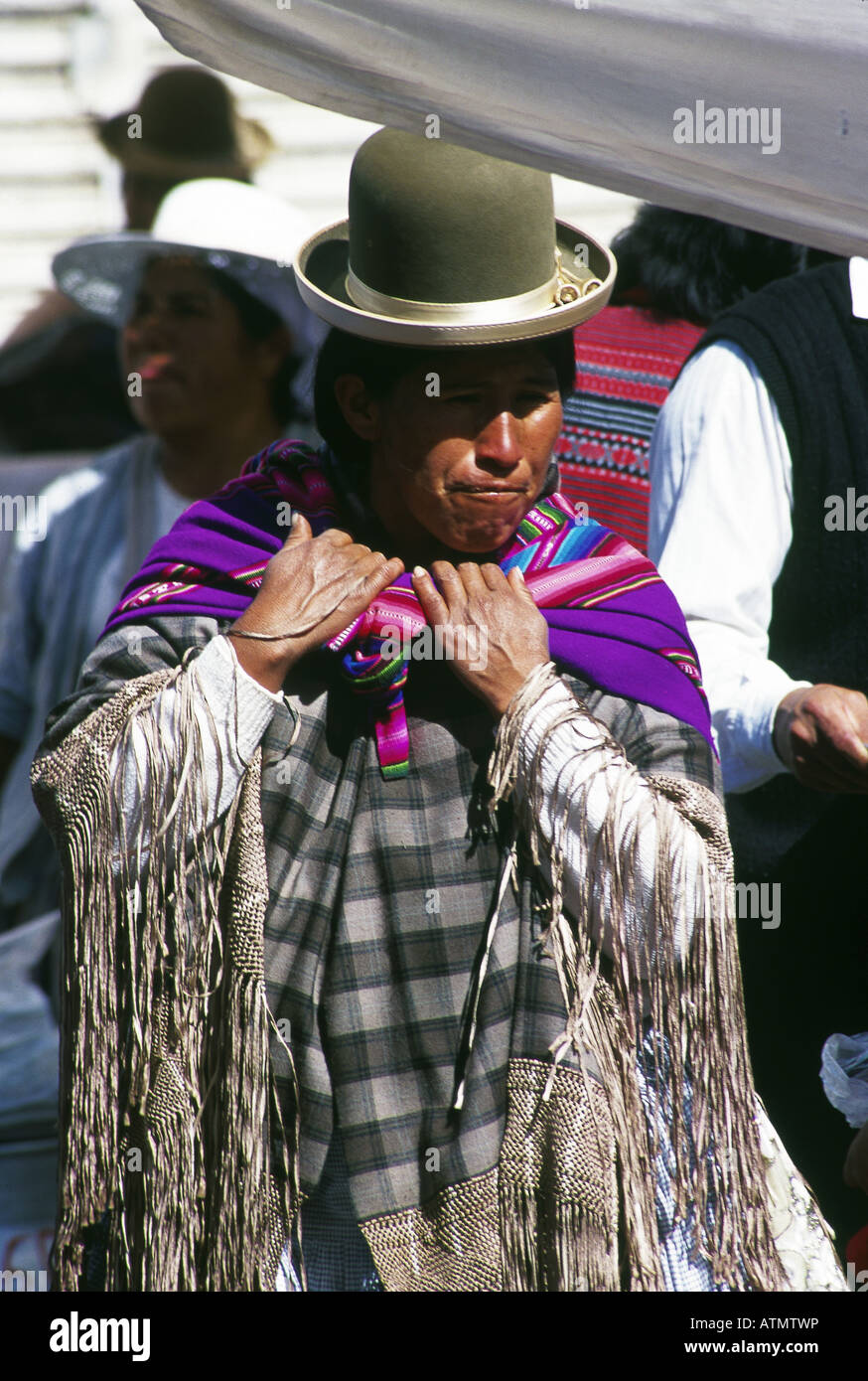Woman in traditional Aymara dress Brown bowler hat felt hat Striped ...