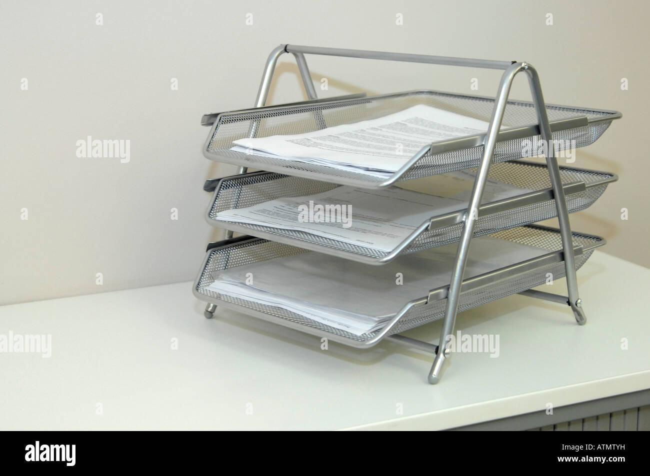 Office paper in tray Stock Photo - Alamy