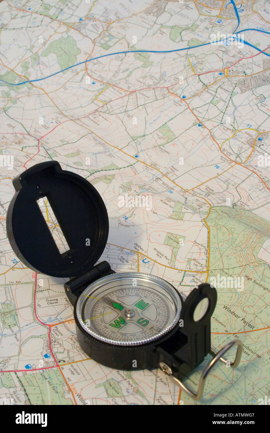 Handbearing compass and map Stock Photo - Alamy