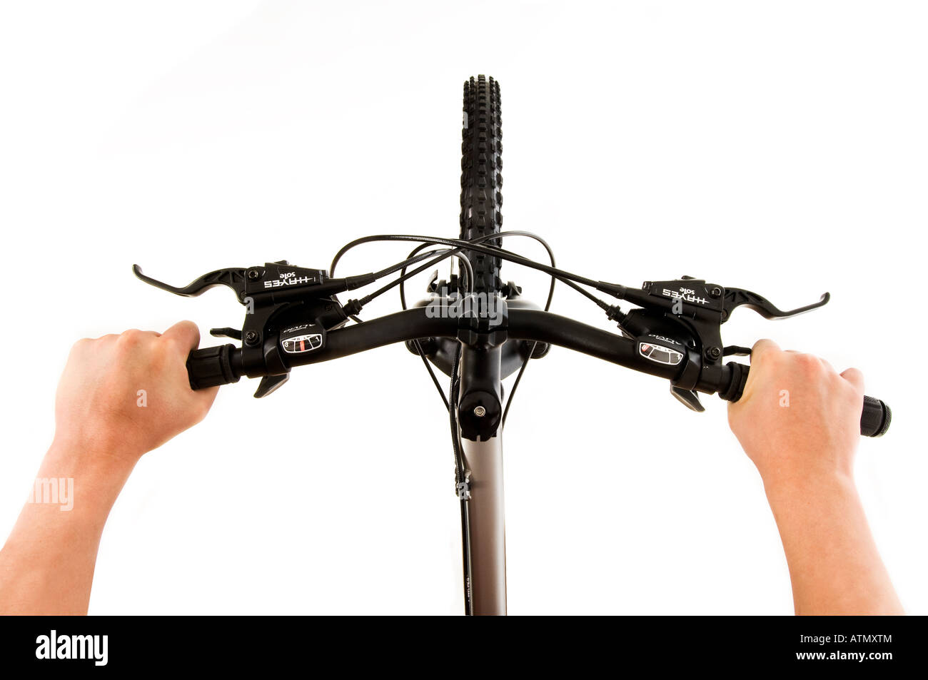 View from above riding position of male Caucasian hands on black ...