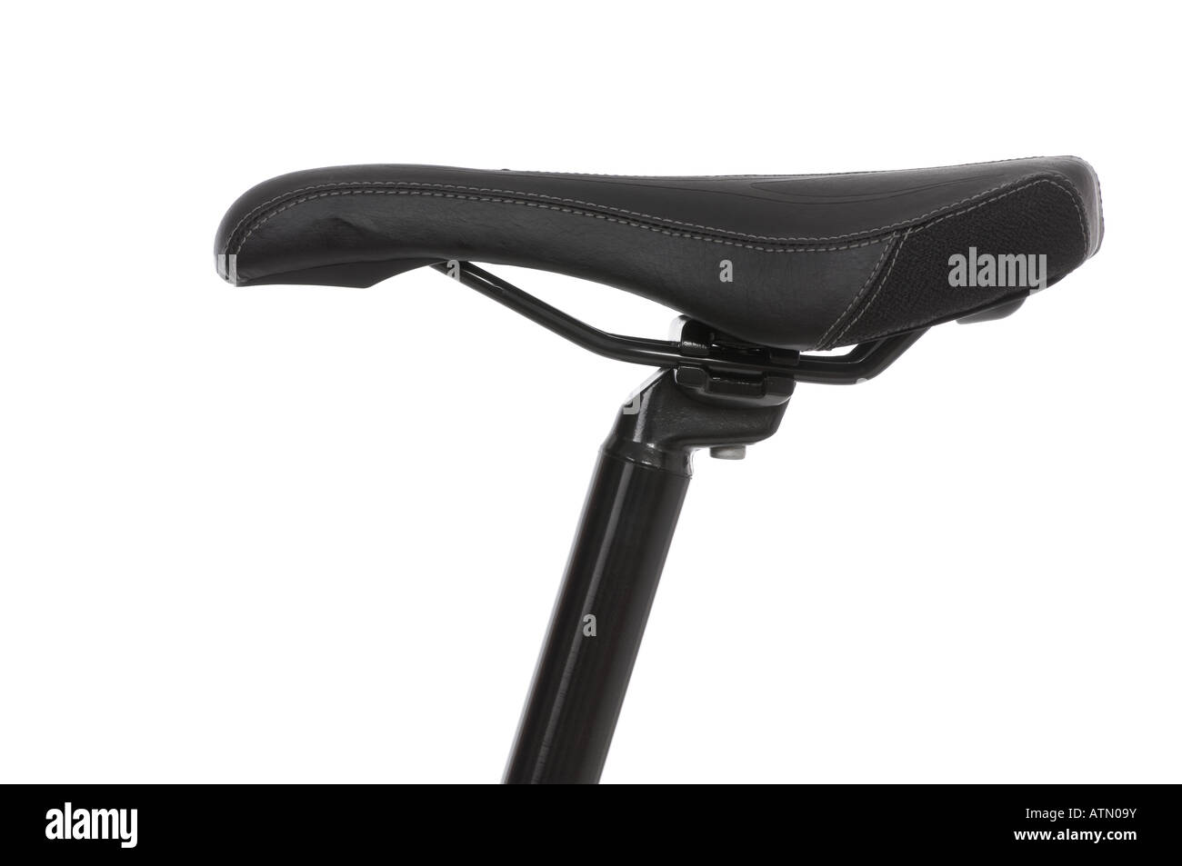 Side view of a black and dark grey leather bike seat seen against a ...