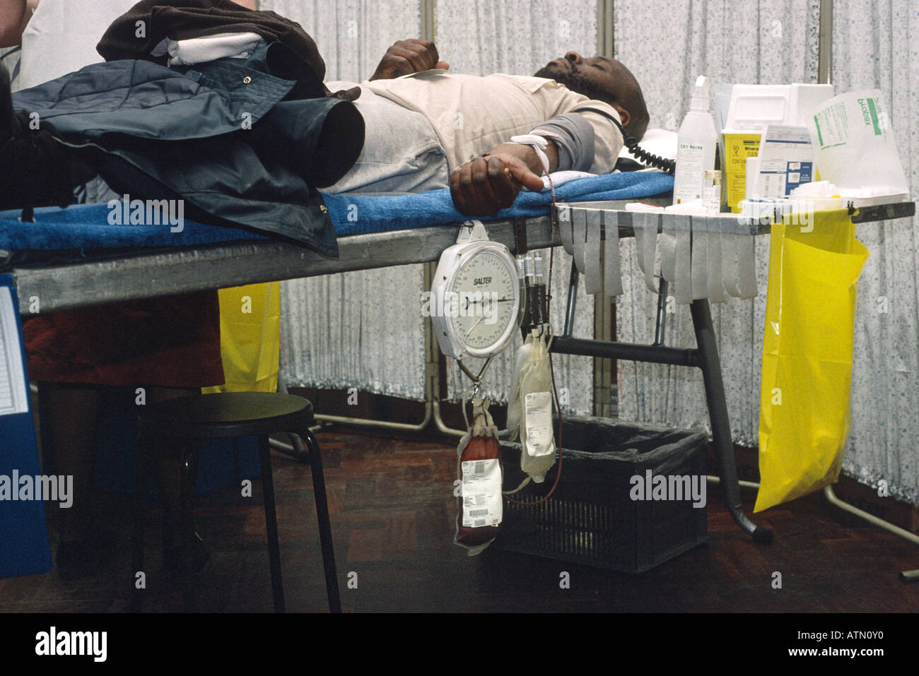 man giving blood in a blood donor clinic Stock Photo - Alamy