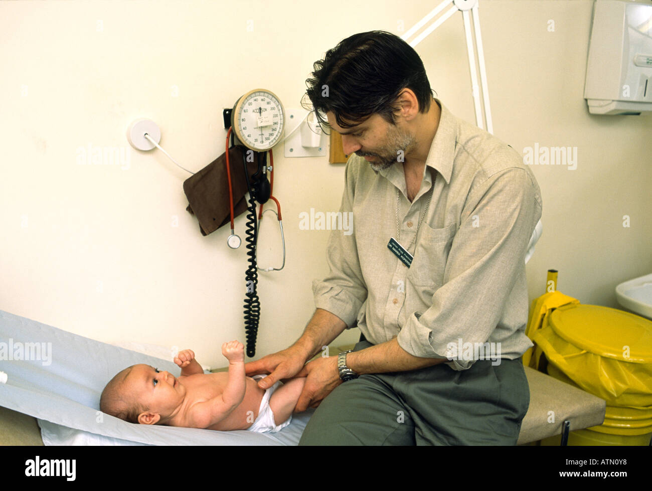Baby check-up with GP Stock Photo - Alamy