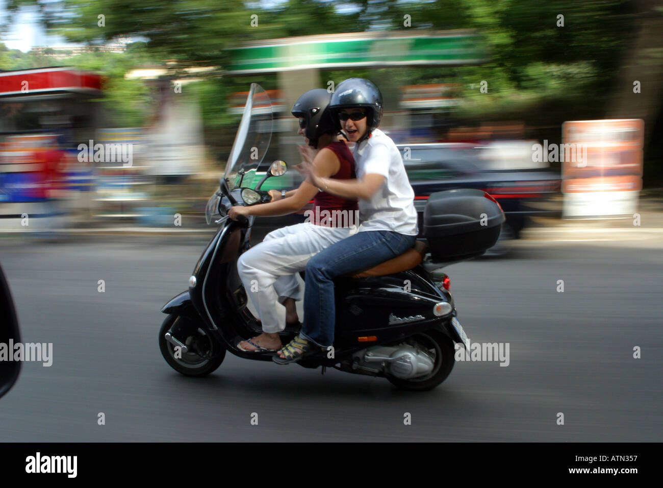 Scooter riders hi-res stock photography and images - Alamy