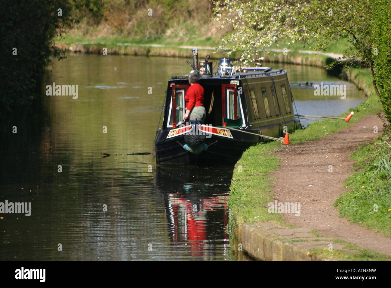 canal curve narrow house boat moored towpath Stock Photo - Alamy